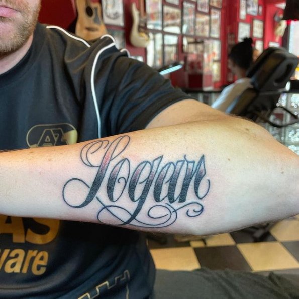 60 Best Arm Writing Tattoos For Boys & Girls - Tidy Tale